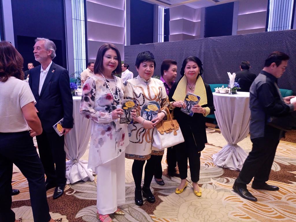 Consul Helen M. Ong, Chairperson and President of SCEI, line up with ...