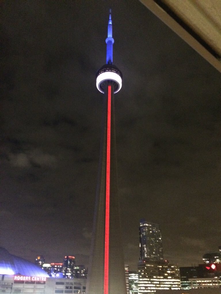 Toronto's CN Tower now lit in red, white and blue. Photo by ...