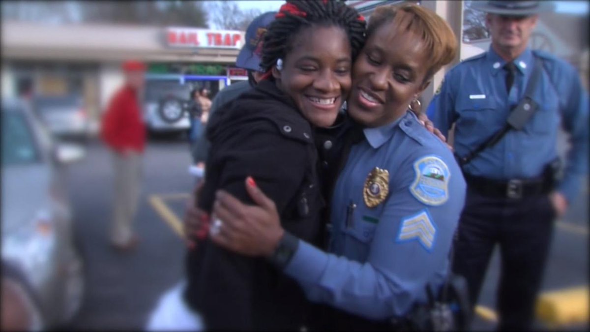 Secret Santa joins Ferguson law enforcement officers to surprise ...