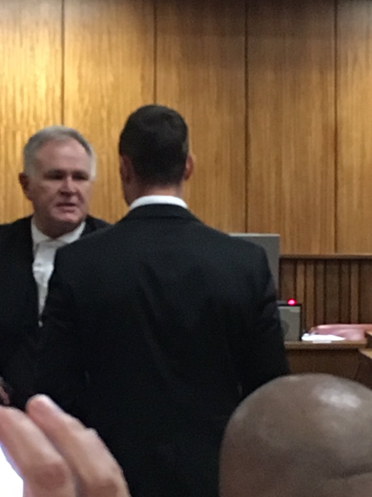 OscarPistorius and his advocate Barry Roux deep in conversation. eNCA ...