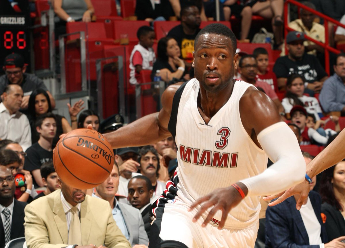 Dwyane Wade hits the winning shot as the Heat score the last 11 points ...