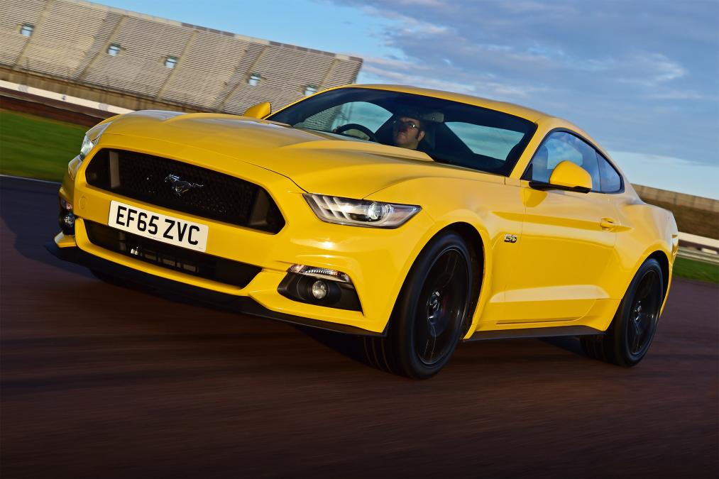 We drive the Ford Mustang V8 in right-hand drive to see if it lives up ...