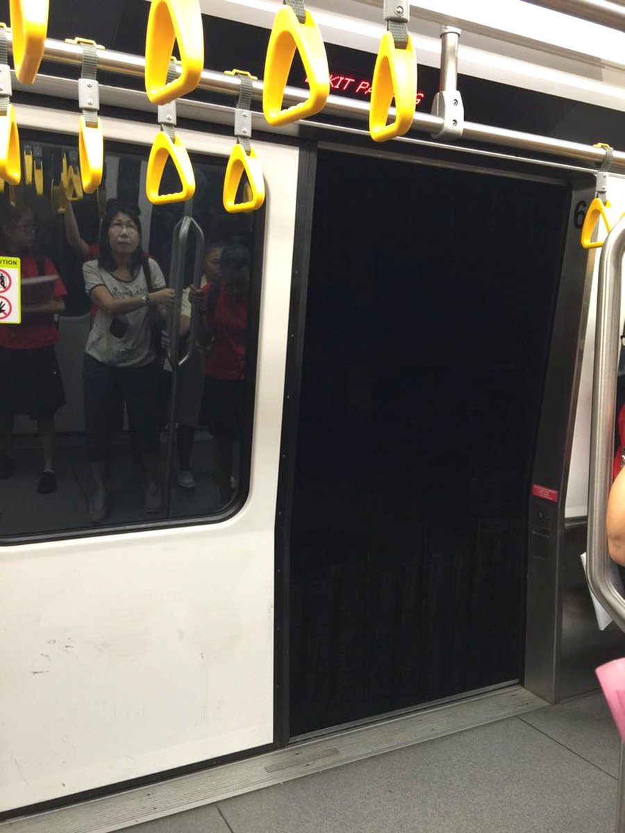 Bukit Panjang LRT door opens while moving towards Senja station | The ...