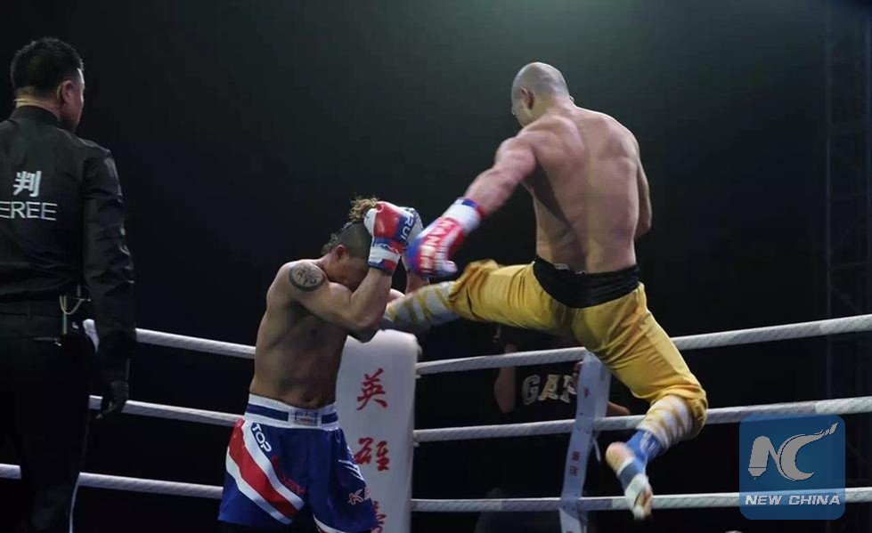 Kungfu monk Yi Long from China's Shaolin Temple K.O. Japanese boxer ...