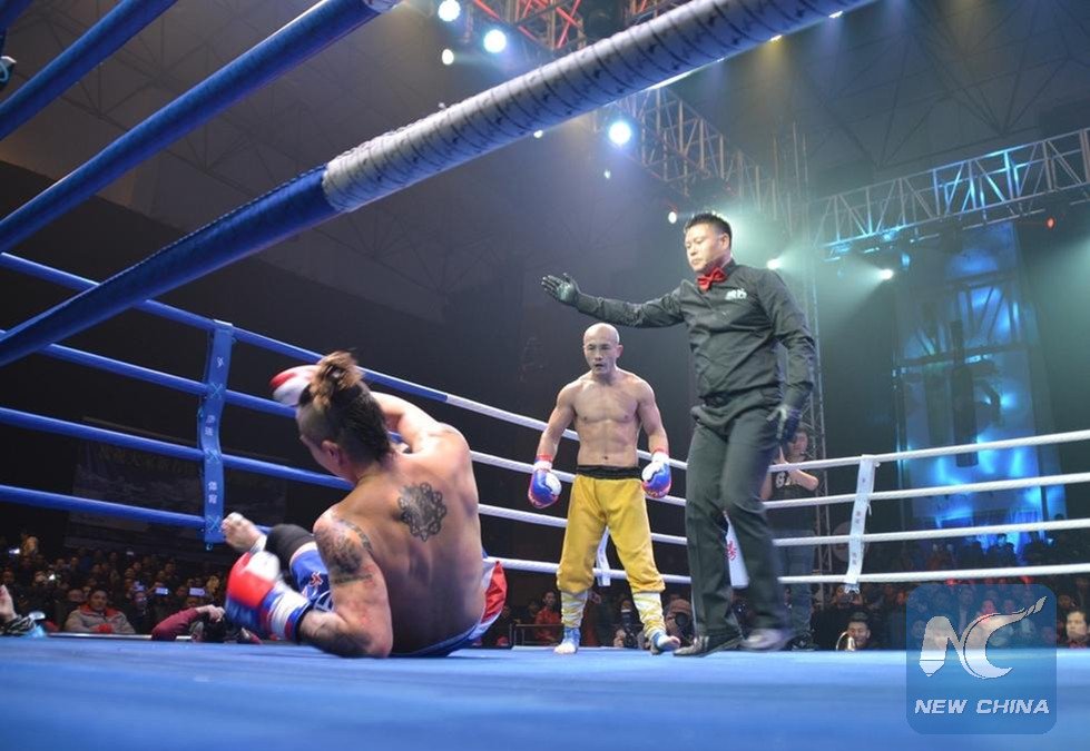 Kungfu monk Yi Long from China's Shaolin Temple K.O. Japanese boxer ...