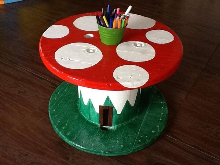 We love this toadstool table made from an old cable reel! It even has a ...