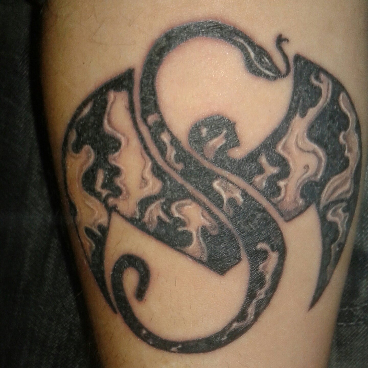 Tech N9ne Logo Tattoo