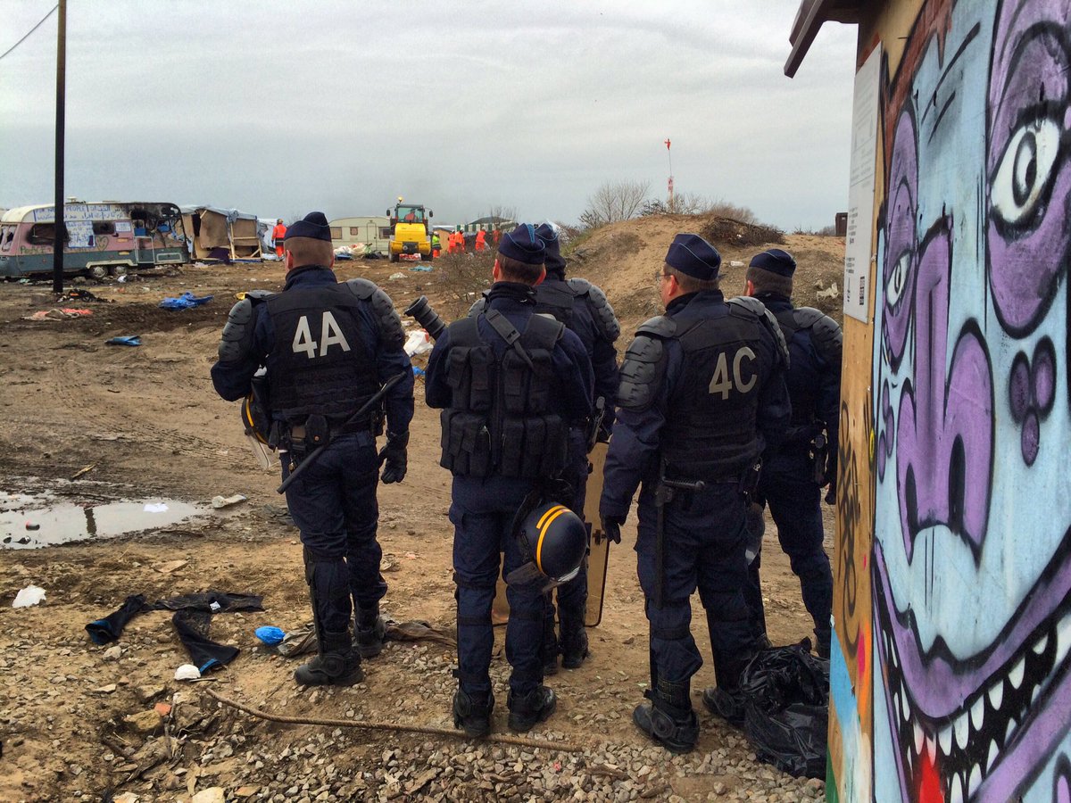 Police armed with CS gas launchers as camp dismantled - ITV News