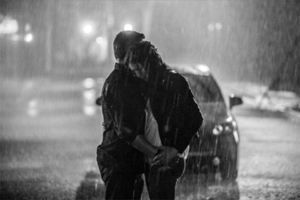 Couple Hug In Rain