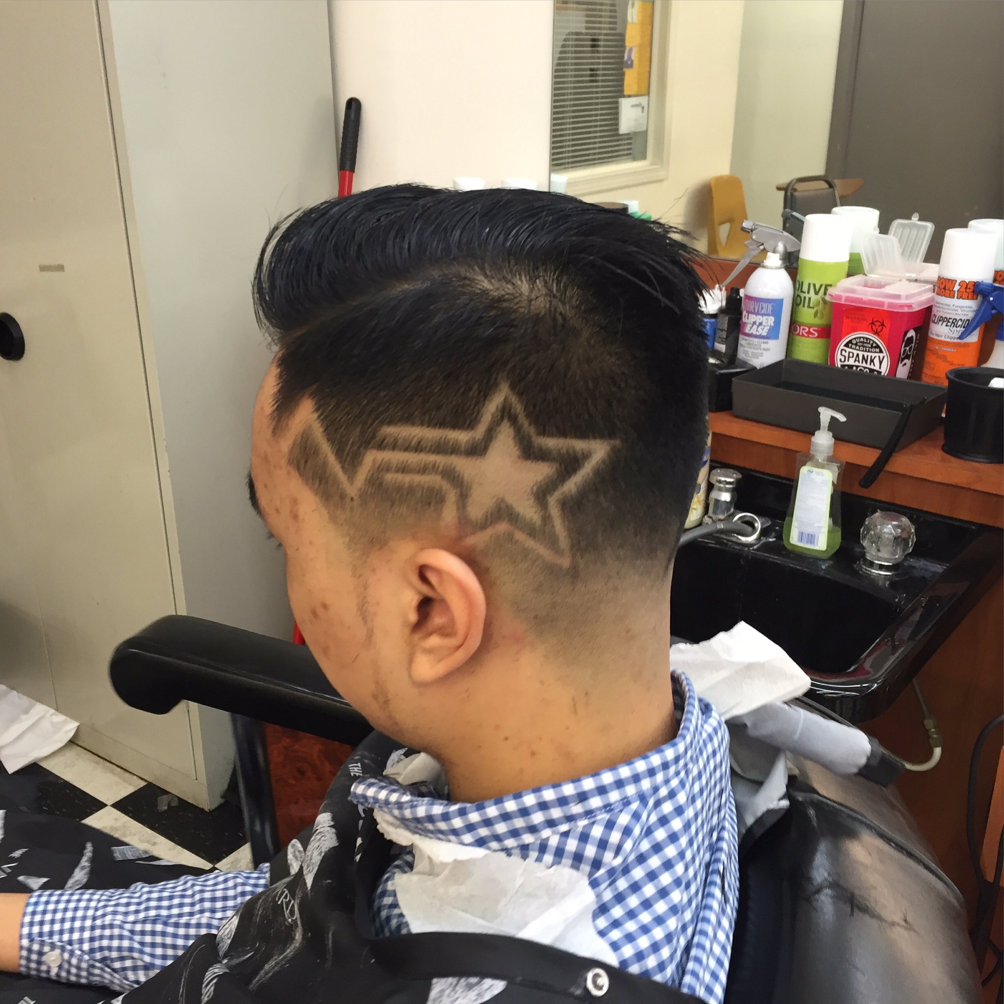 Mohawk Fade With Star Designs