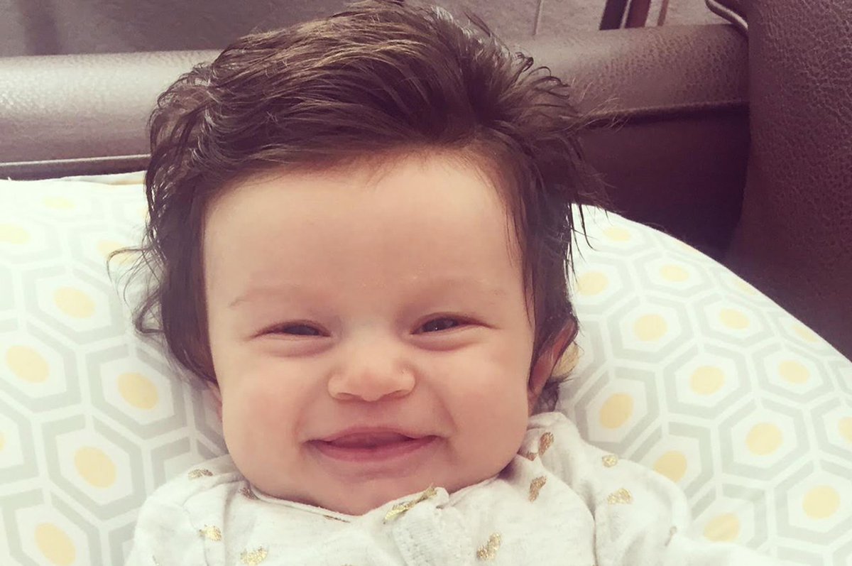 Baby Izzy was born with a full head of hair and is now going viral on ...
