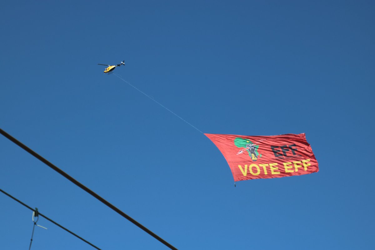 RT nzimandebafana: A helicopter carrying the EFF flag is seen above ...