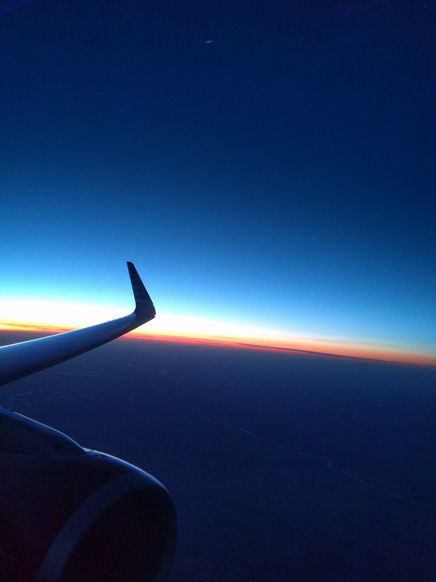 Airplane In The Sky At Night