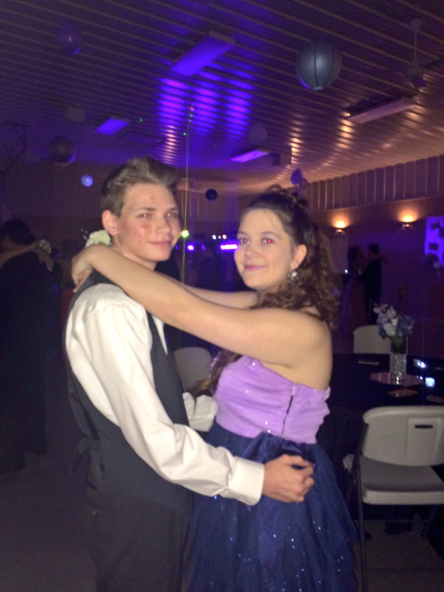 Couple Slow Dancing At Prom