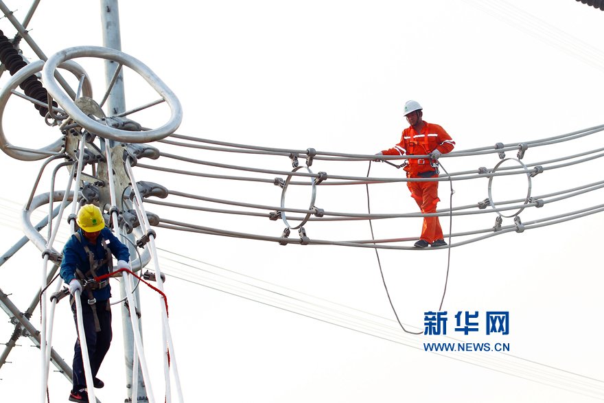 Pics taken by drone show workers on ultra-high-voltage power lines in E ...