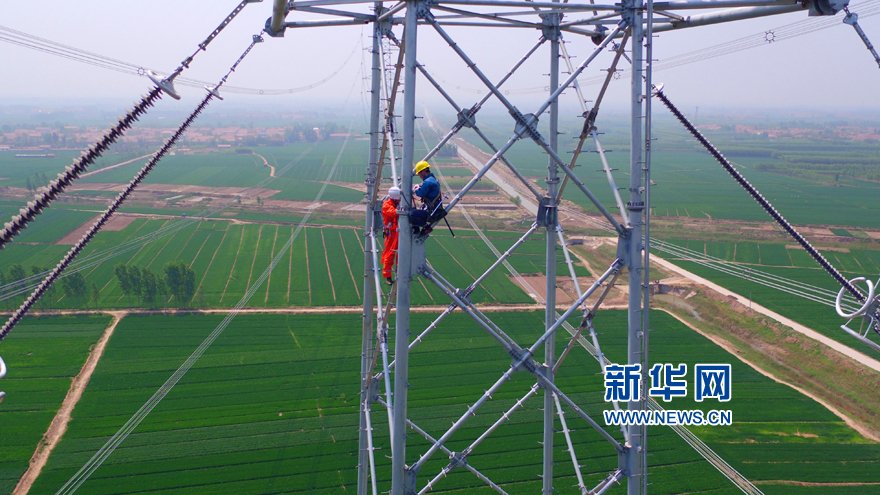 Pics taken by drone show workers on ultra-high-voltage power lines in E ...