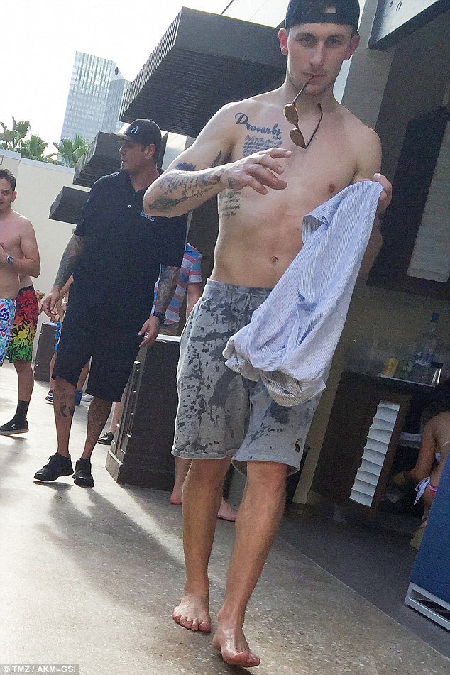 Johnny Manziel shows off new tattoos at Vegas pool party | Daily Mail US | Scoopnest