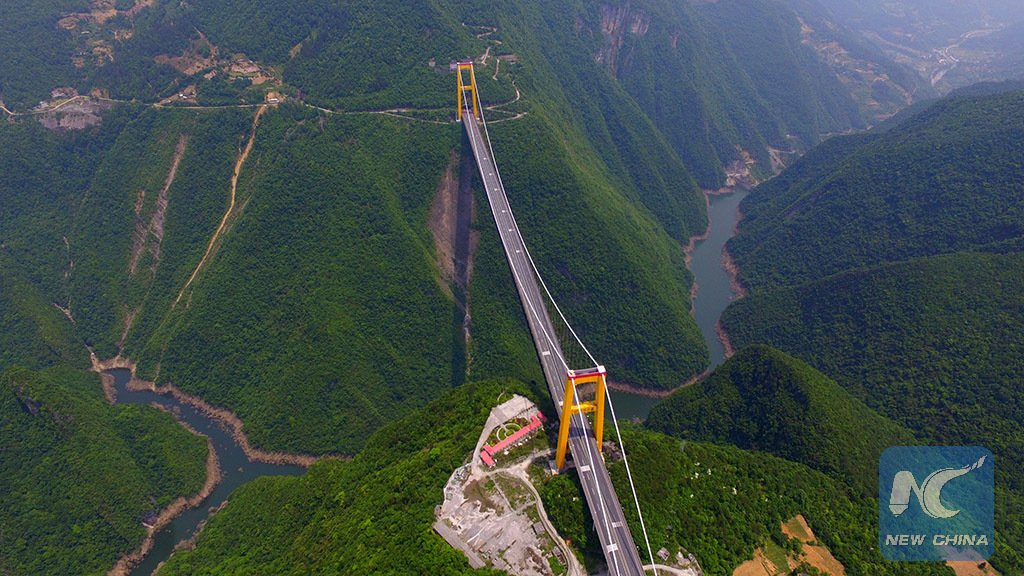 Built 560 meters up from the valley bottom, the Siduhe bridge in Enshi ...