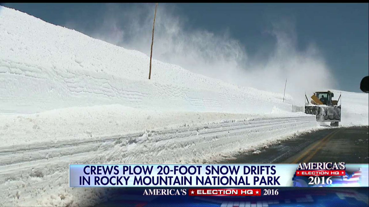 Crews plow 20-foot snow drifts in rocky mountain national park ...