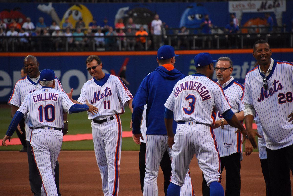 Know your roots. The current team shakes hands with the 1986 Mets ...