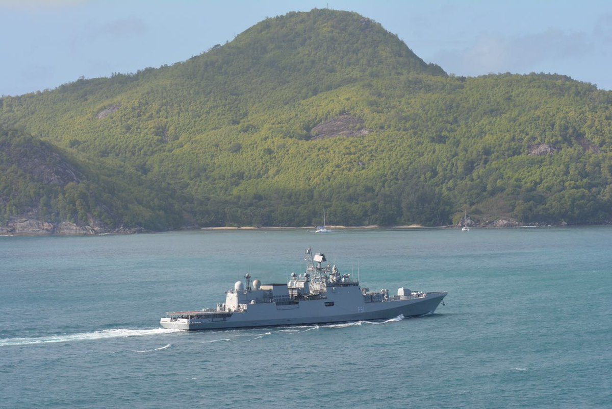 INS Trikand of the Indian Navy enters Port Victoria, Seychelles on an ...