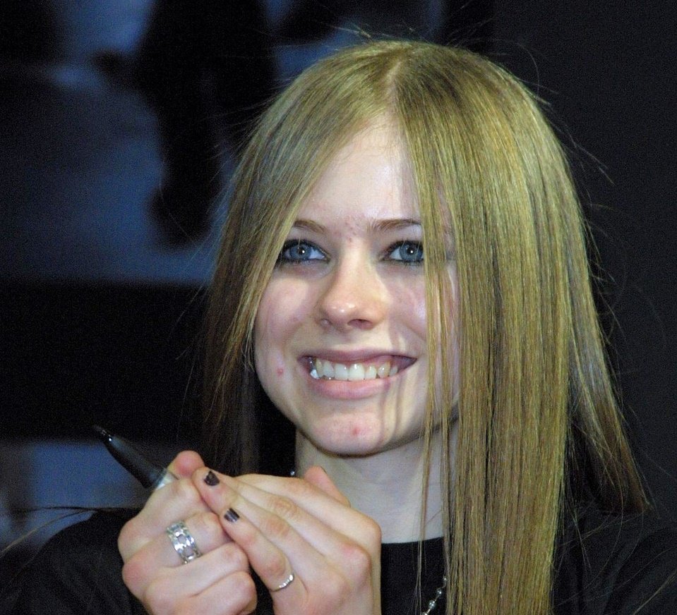 Avril Lavigne Acne Avril Lavigne Showcases Her Edgy Style With Orange