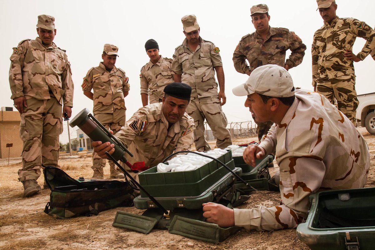 Iraq-i soldiers practice deploying an M58 mine clearing line charge ...