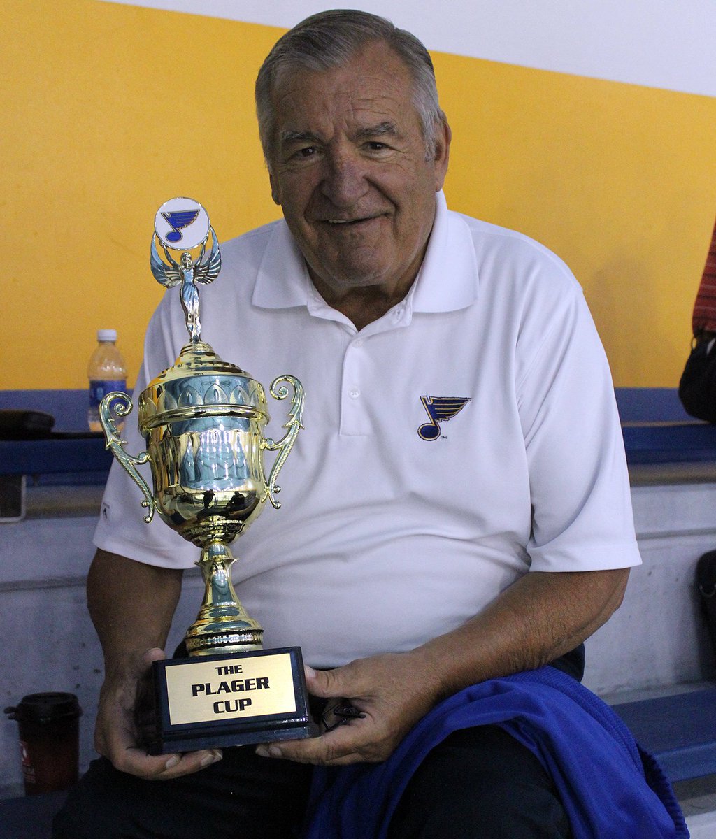 Bob Plager is standing by to present the Plager Cup to the winning team ...