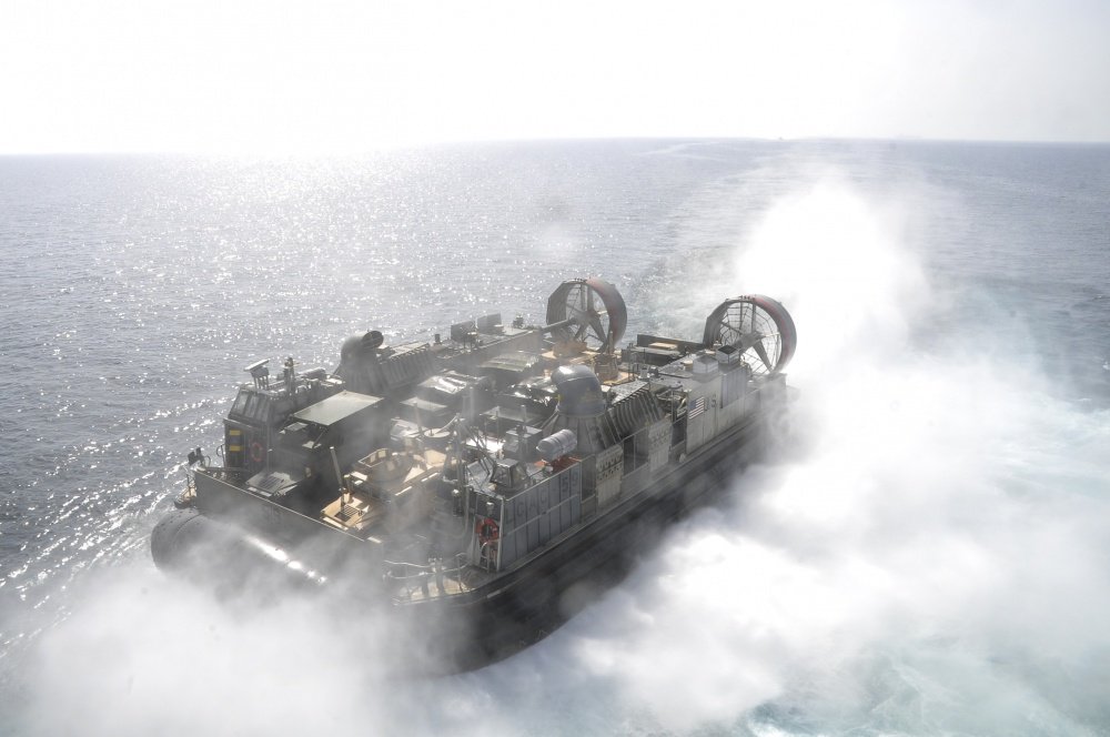 A LCAC exits the well deck of the amphibious assault ship USSBoxer ...