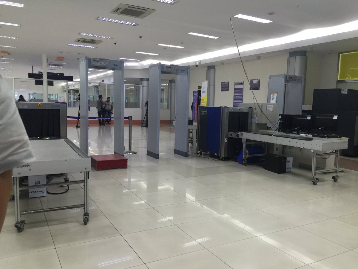 Just like naia, clark airport has two layers of security screenings ...