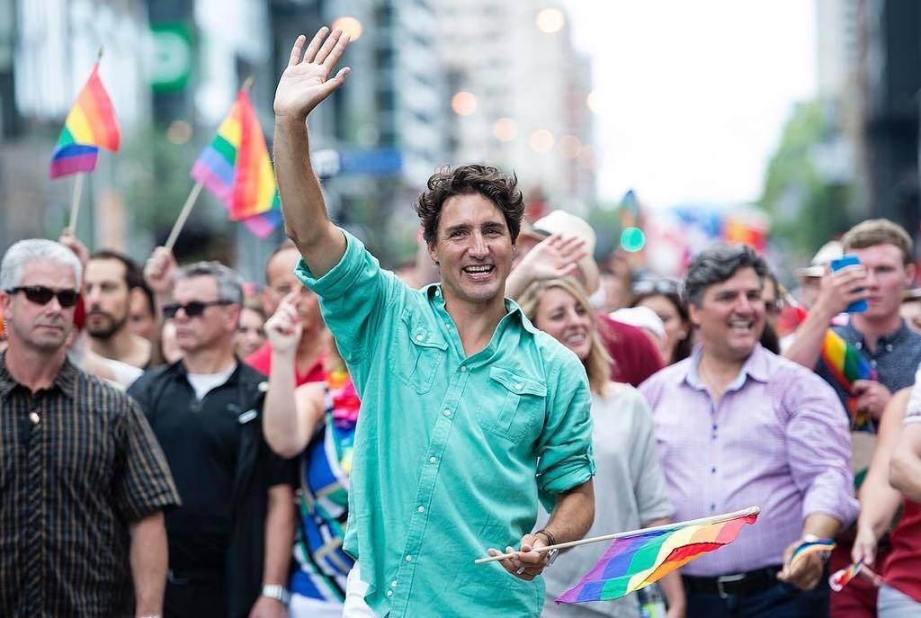 Justin Trudeau waves to the crowd as he attends the annual pride parade ... Justin Trudeau waves to the crowd as he attends the annual pride parade ...