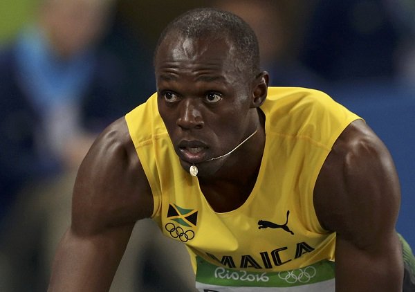 World's fastest man, UsainBolt, with his Miraculous Medal before ...