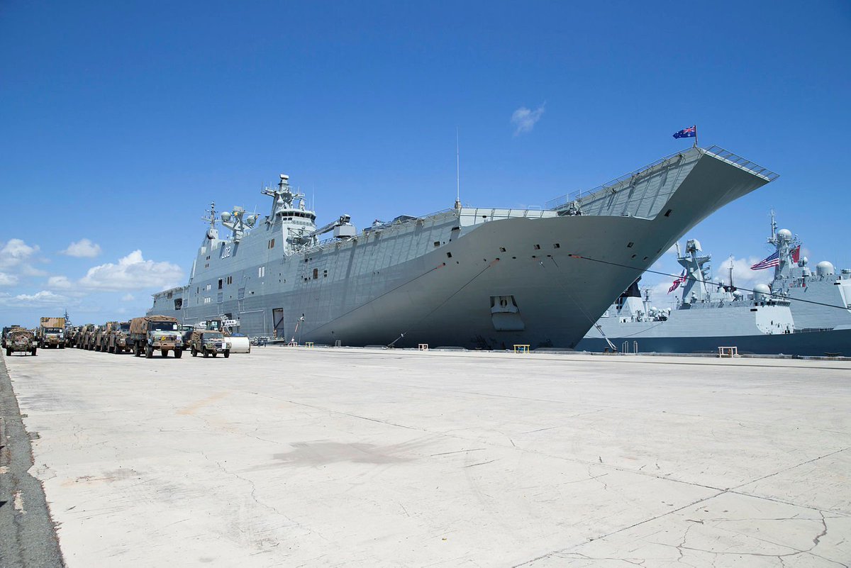 Vehicles queue on the wharf at Joint Base Pearl Harbor-Hickam before ...