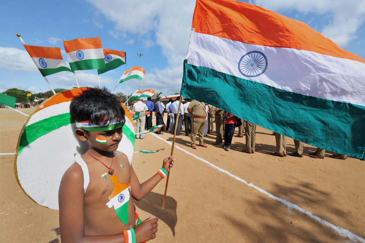 A boy carries Tri-colours during IndependenceDayIndia function in ...