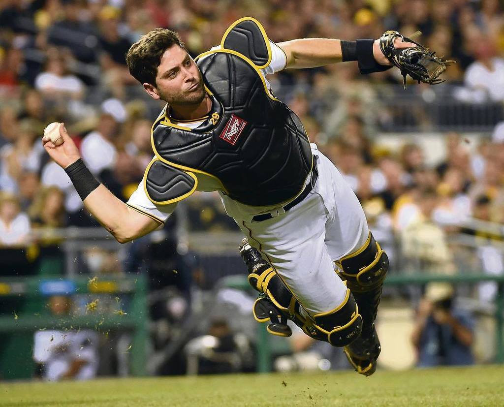 Pirates catcher Francisco Cervelli goes airborne to throw out the ...