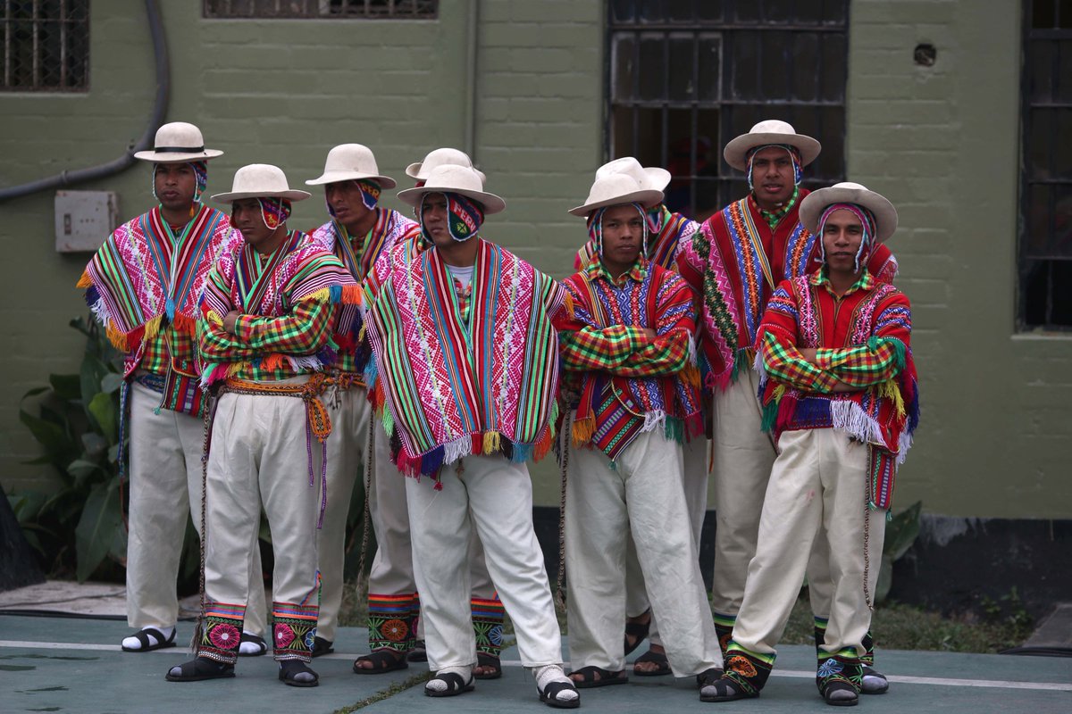Andean: Inmates in traditional Andean clothing perform for Folklore Day ...