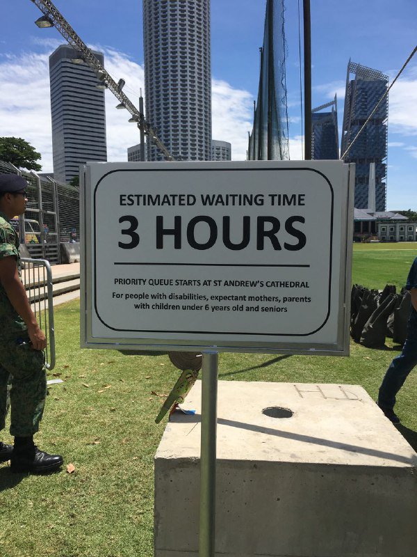 RememberingSRNathan Signs showing estimated waiting time of the queues ...