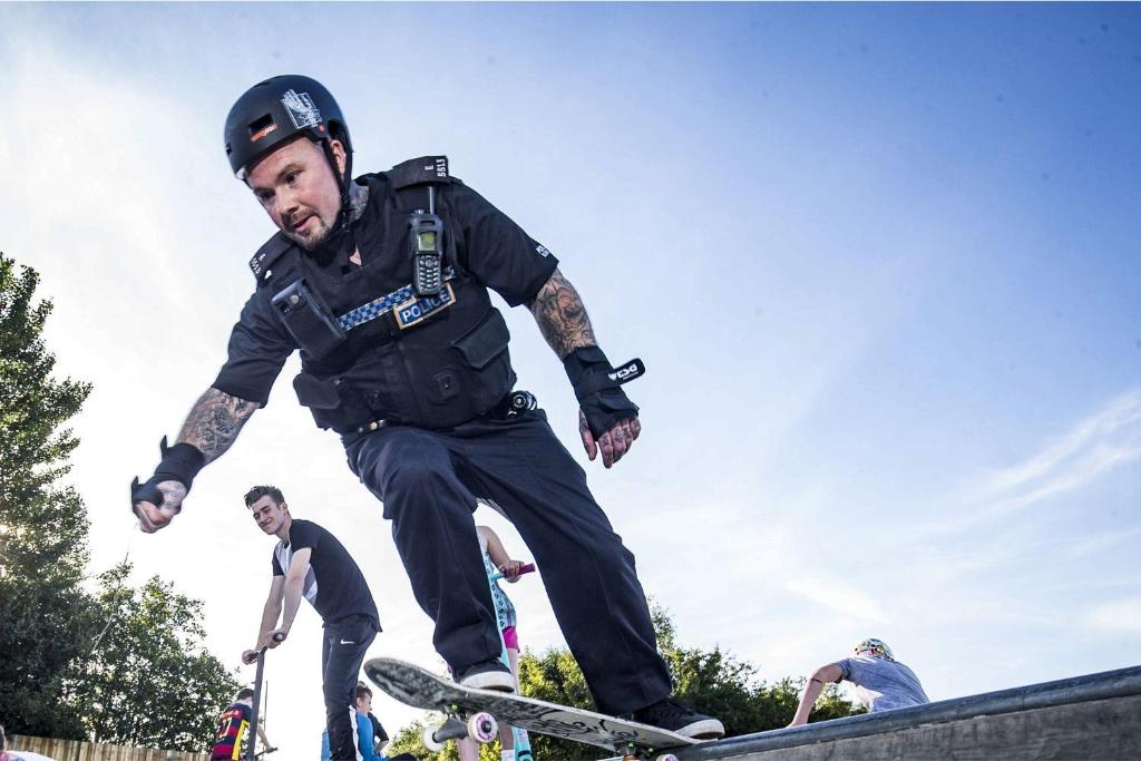 Punk rozzer: Skateboarding cop with tattoos and Mohawk hair | The ...