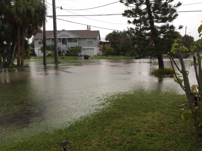 Officers w HolmesBeachPD warn people don't drive through flood water ...
