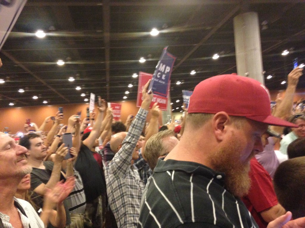 Trump takes the stage in front of a dense crowd in the Phoenix ...