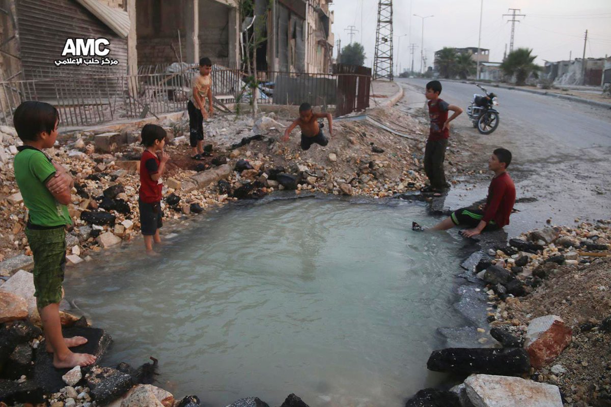 "Life is not over." Syrian kids swim in this makeshift swimming pool ...