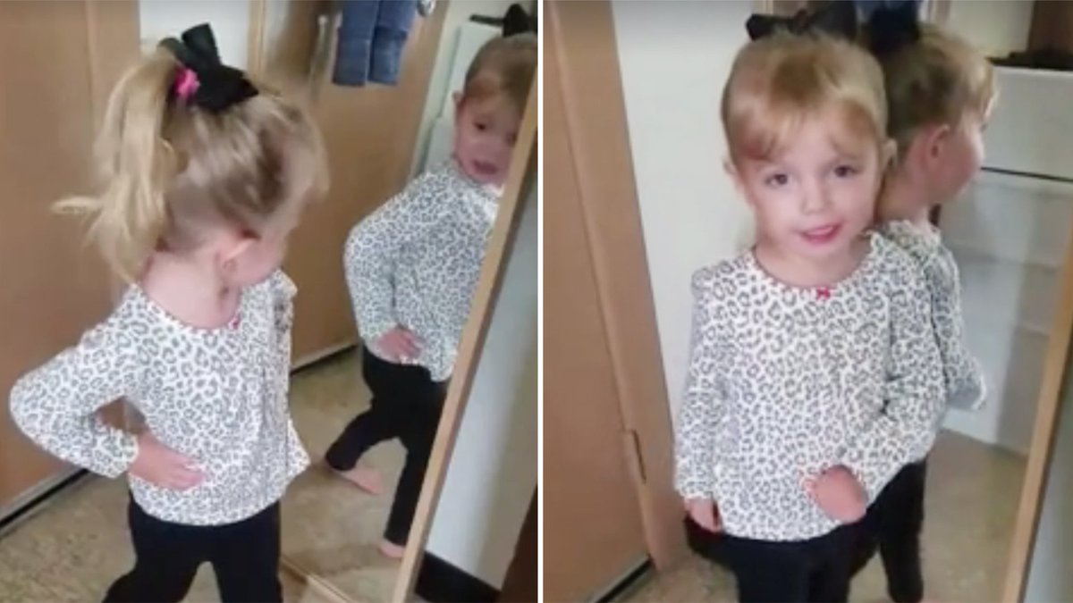 Watch this little girl say 'I'm cute' in the mirror a gazillion times ...
