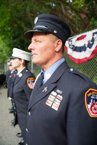 Fdny members gather at a 9/11 commemoration ceremony at fdny ems ...