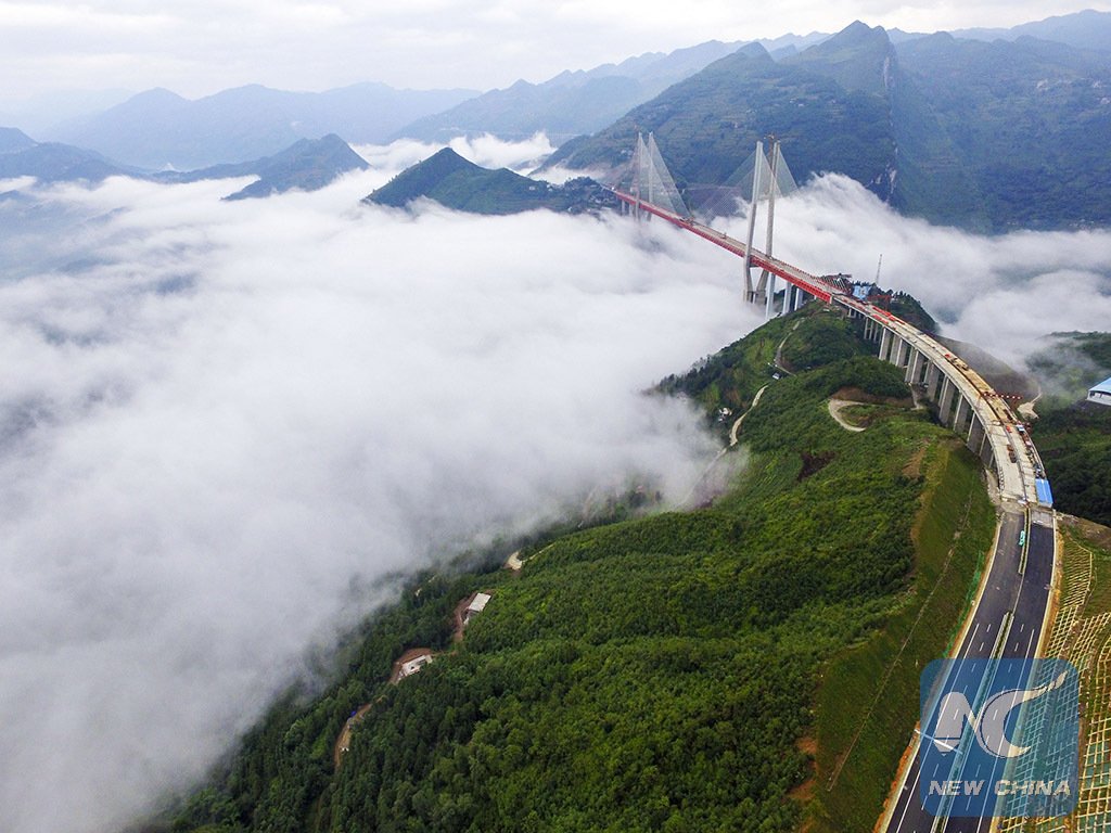 Beipanjiang Bridge, possible the tallest bridge in the world, has a ...