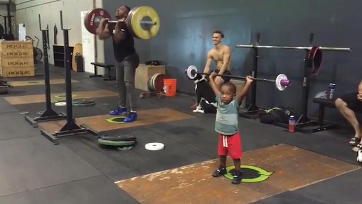 Black Baby Lifting Weights