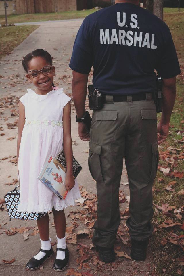 Ruby Bridges: Look! A mini Ruby Bridges pictured with her dad, who is a U