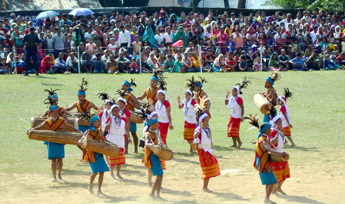 Garo tribal boys & girls perform wangala dance during 39th 100 drums ...