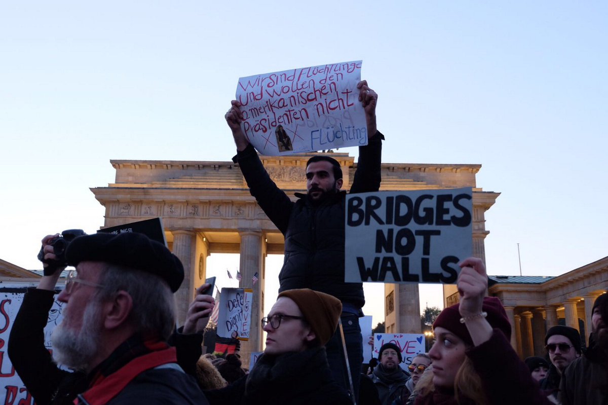 Over 500 protesters, including American expats, gathered in front of ...