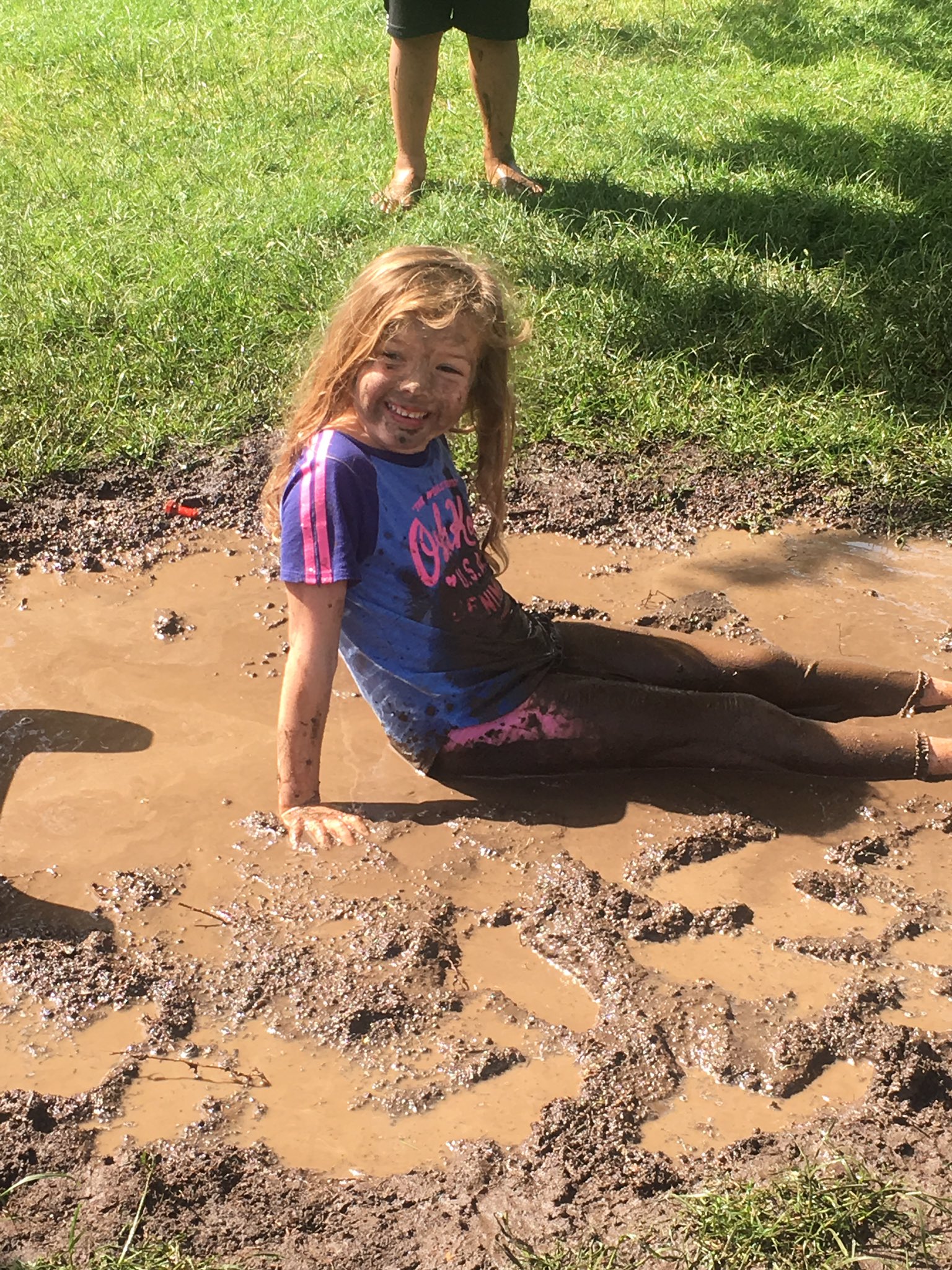 Little Girl Stuck In Mud