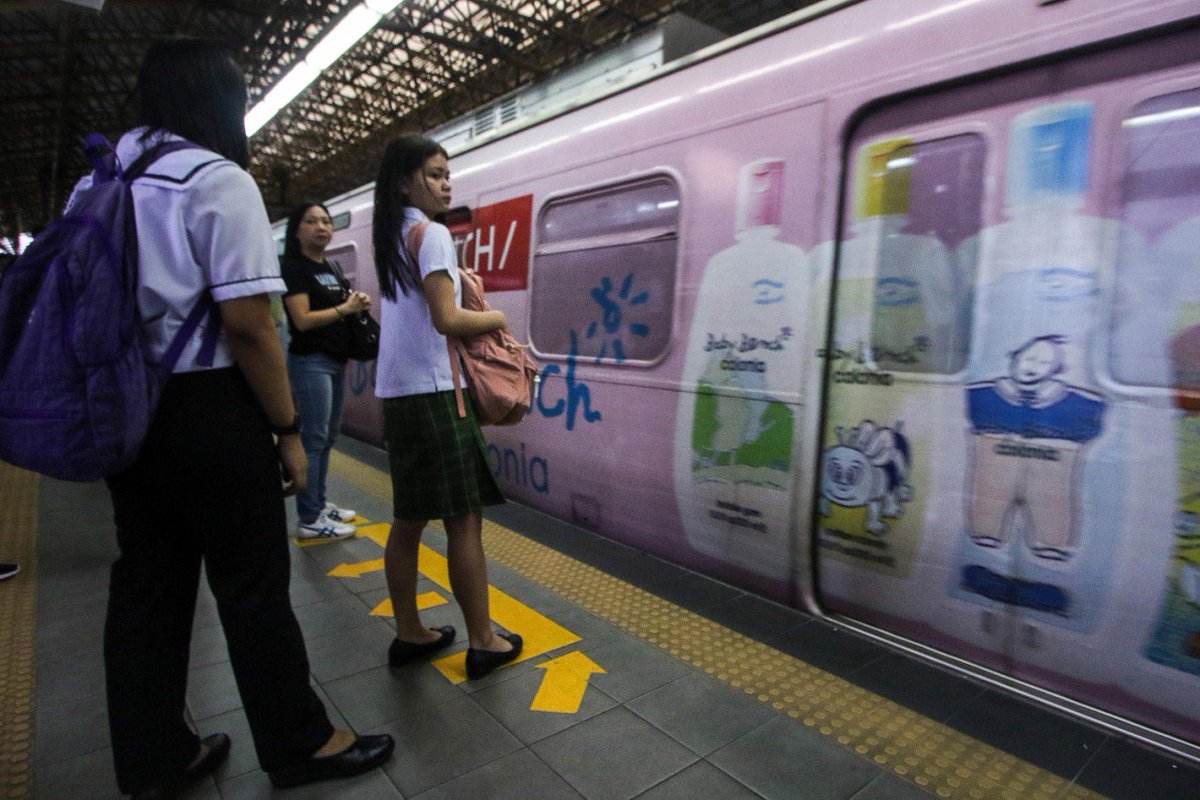 LOOK: Students disembark the LRT train coaches at Legarda Station ...